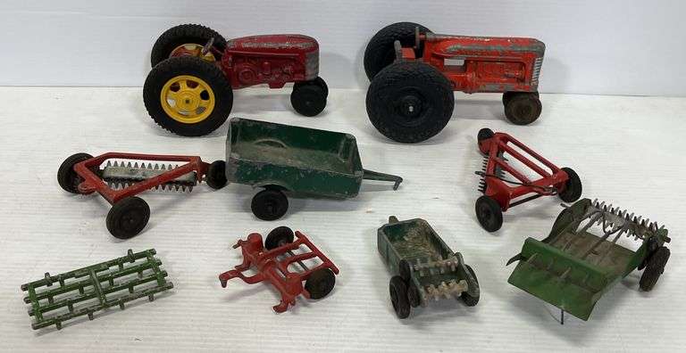 (9) 1950s and 1960s Slik toys, 1:32 scale, includes: Hay rakes, hay ...