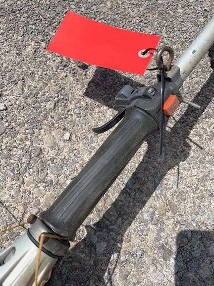 Red Max weed wacker, 72"L, used - Albrecht Auction Service