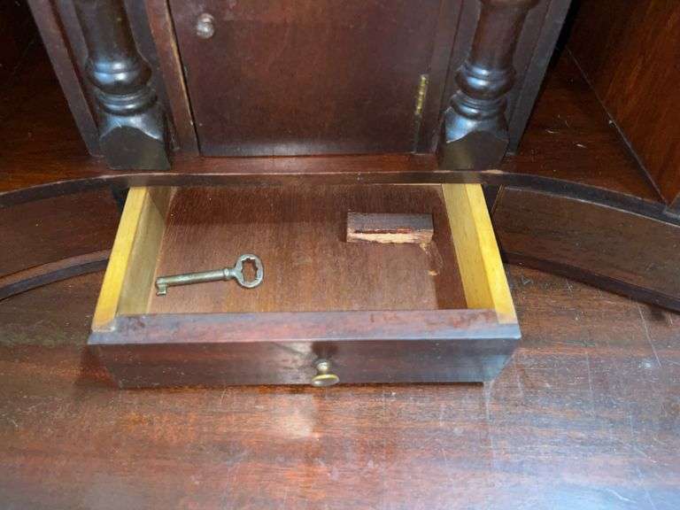 Older secretary wooden desk with original key, two claw feet, batwing ...