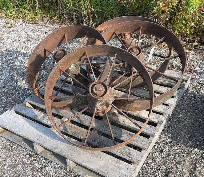 (4) Antique steel wheels, 25 1/2"W - Albrecht Auction Service
