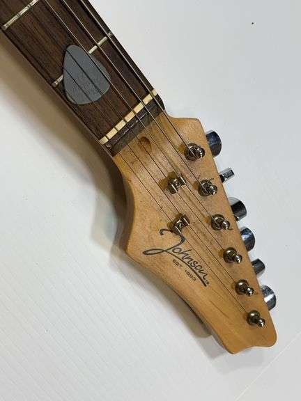 Johnson electric guitar, includes strap, tuner, picks, and cord, good ...