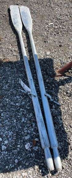 Pair of oars, silver in color, 70"L - Albrecht Auction Service