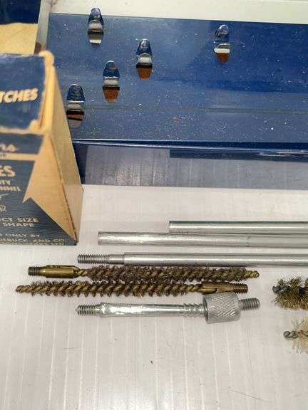 Gun related items from a reloading bench, includes huller puller, gun ...