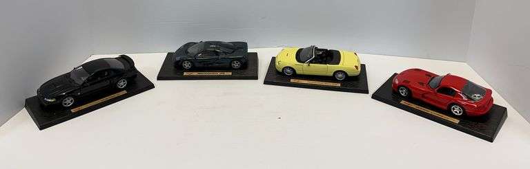 (4) Maisto display cars, include: 1- Thunderbird, 1- Anniversary ...