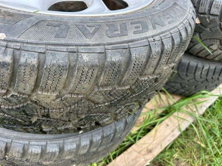 (4)-Etoria 215/60R16 950 Tires on Aluminum Rims - Albrecht Auction Service