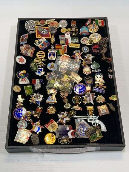 Antique and vintage pins and pendants, mostly Olympic pieces with a few ...