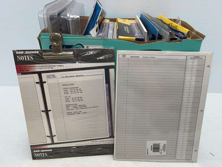 Large box of office supplies, many new packages of Officemax photo ...