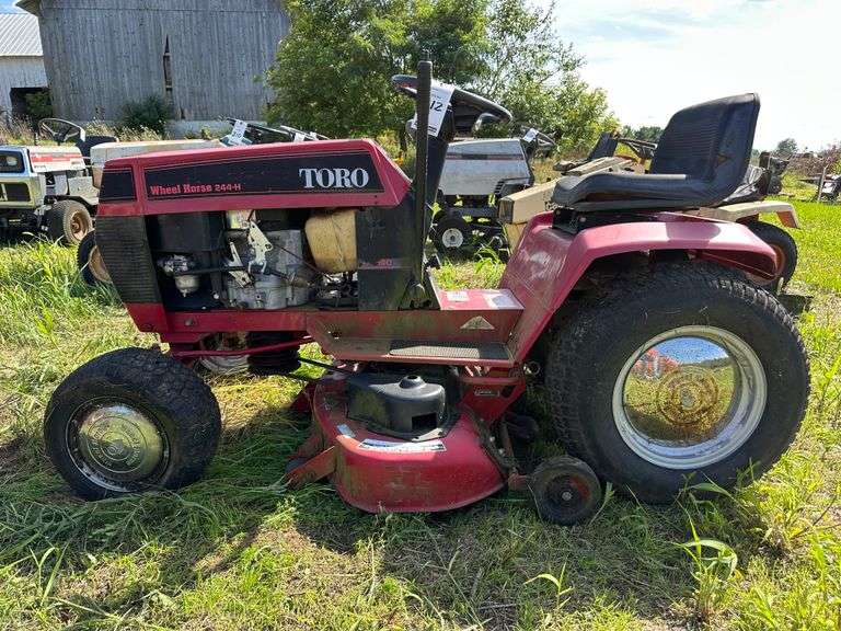 Toro Wheel Horse 244-H Lawn Tractor, 42" Deck - Albrecht Auction Service