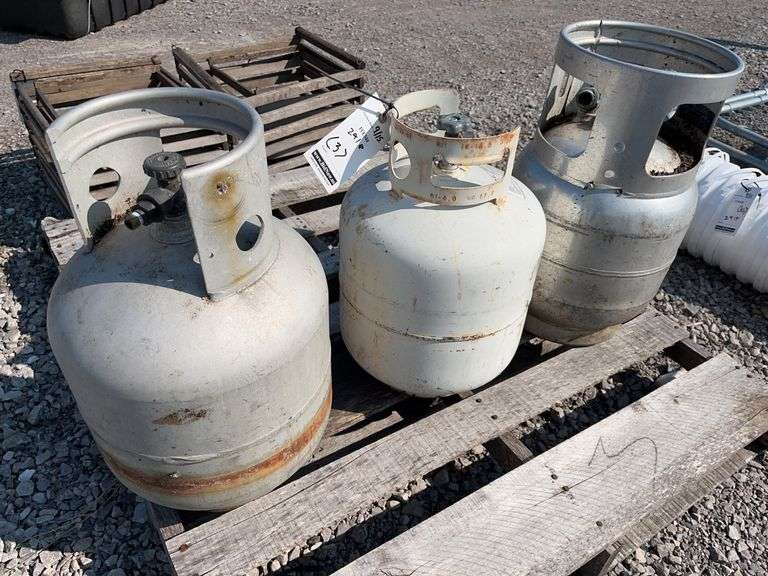 (3) Propane tanks, includes: 1- Commercial 20 lb., the valve is for ...