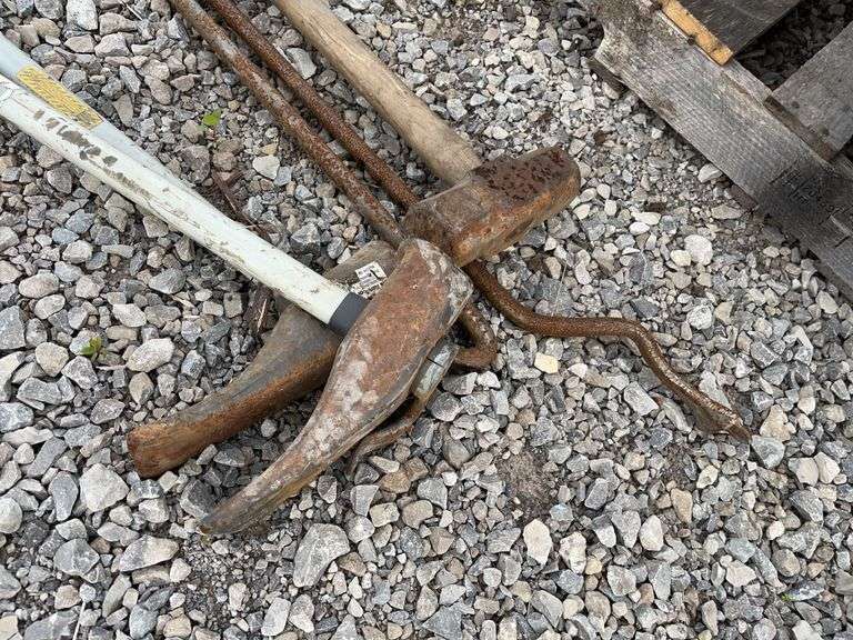 (2) Tire irons, (1) 10-point sledgehammer, and (2) Duck-billed bead ...