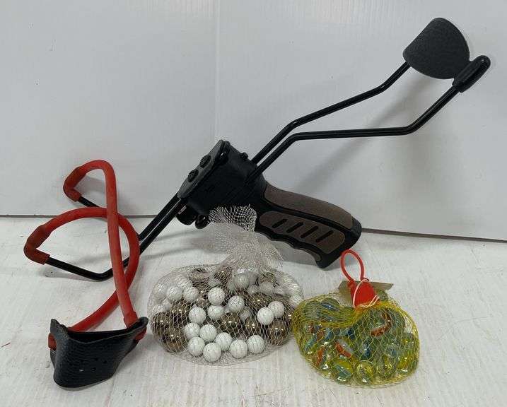 Laser guided wrist rocket slingshot with marbles and stainless steel ...