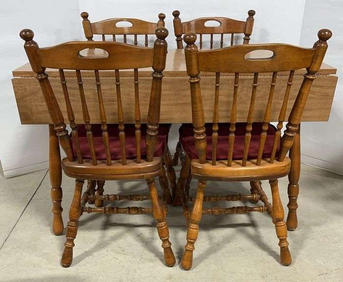 Kitchen table with wing extensions and (4) Maple chairs with attached ...