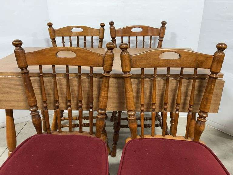 Kitchen table with wing extensions and (4) Maple chairs with attached ...
