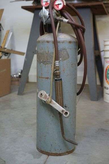 Tank With Torch - Auction Ohio
