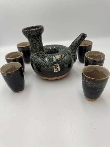 Japanese 7 piece pottery Sake set. Unique! - Auction Ohio