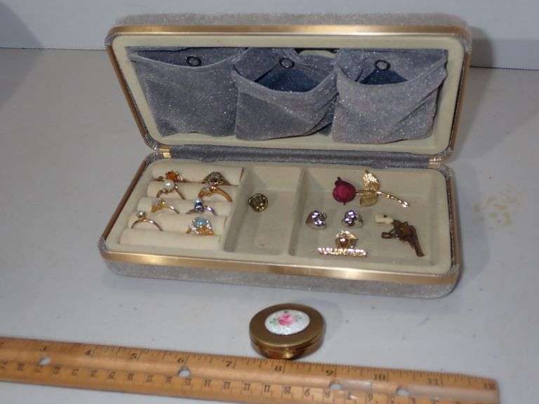 Jewelry box filled with rings, pins, brooch, pill box, gun keychain ...