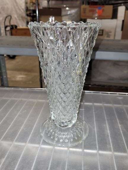 Elegant cut glass vase featuring a diamond-point pattern with intricate ...