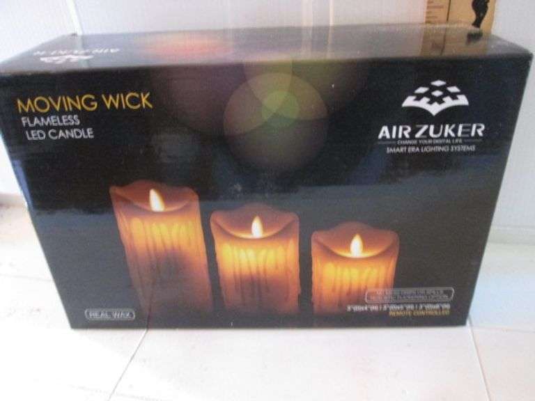 Moving Wick Flameless LED Candles 3 piece With Remote In Box - Auction Ohio