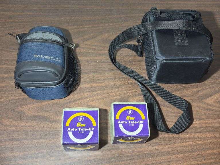 2 Camera Lens and Two Camera Cases - Auction Ohio