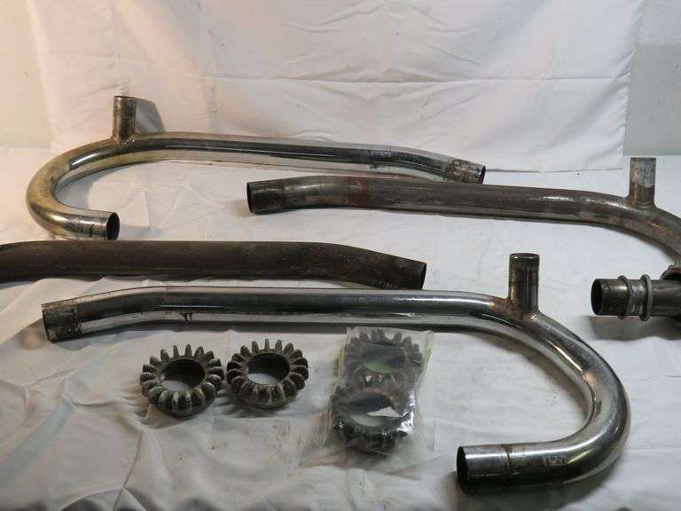 Header pipes with exhaust nuts - Auction Ohio