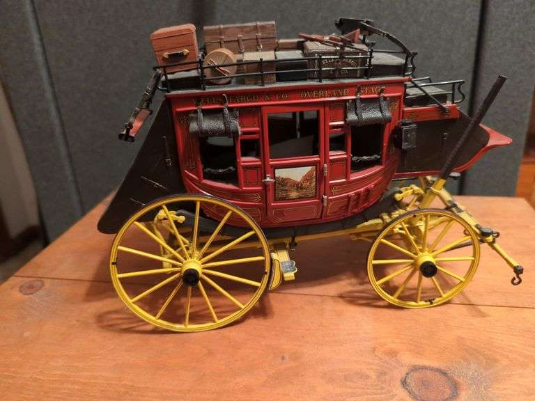 Cast iron stage coach replica - Auction Ohio