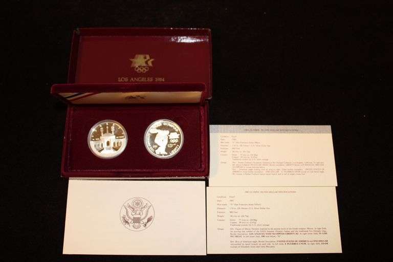 Variety of coins and Canon Cameras! - Auction Ohio