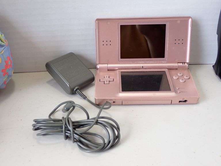 Pink Nintendo DS Lite w/powercord. Crack in plastic. Light Powers on ...