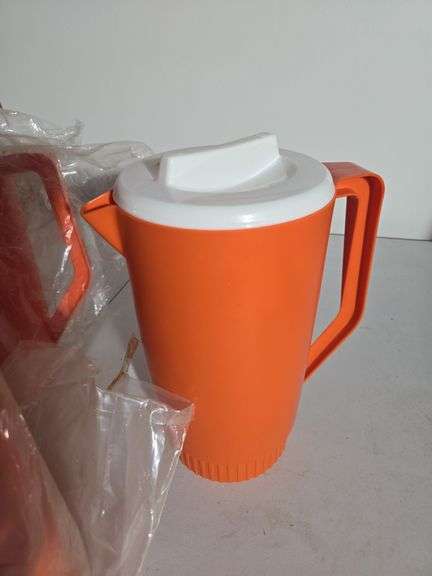 Vintage rubber made pitchers. - Auction Ohio