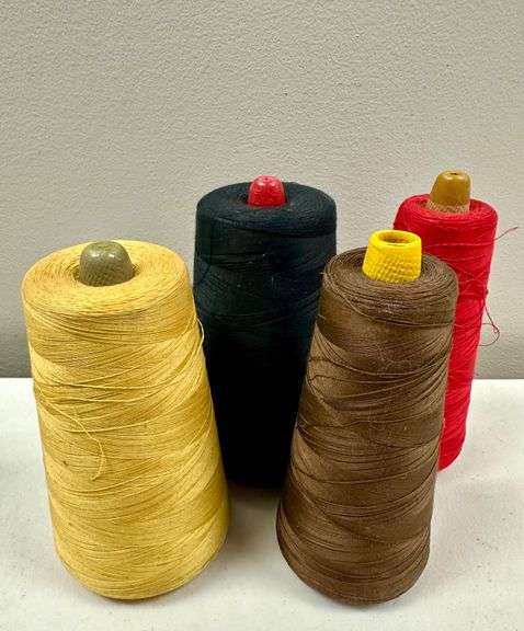 Four Vintage Cones of Thread - Auction Ohio