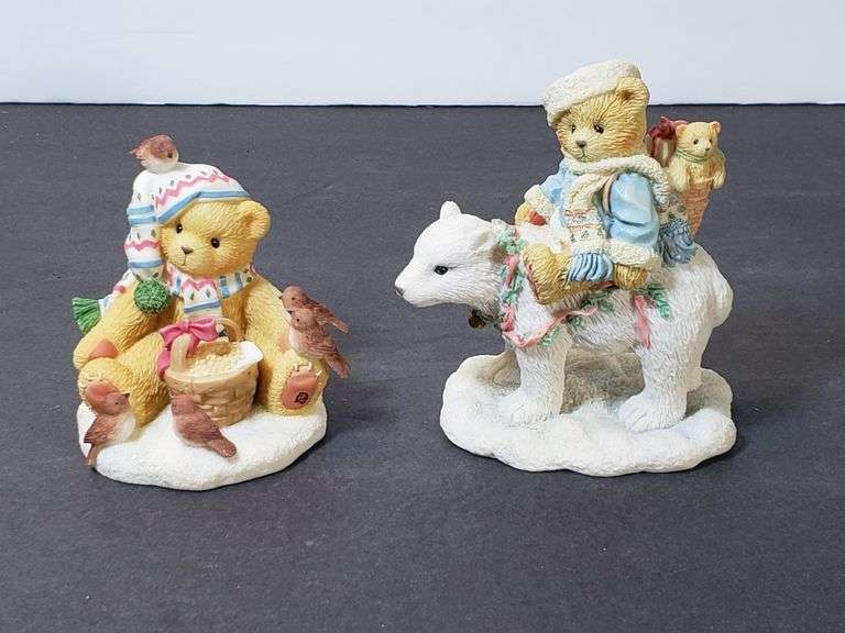 Two Snow Figurines - Auction Ohio