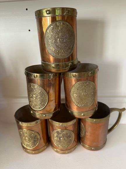 Copper Mayan tankards - Auction Ohio