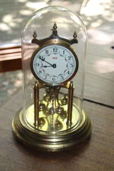 Kundo Anniversary Clock - Auction Ohio