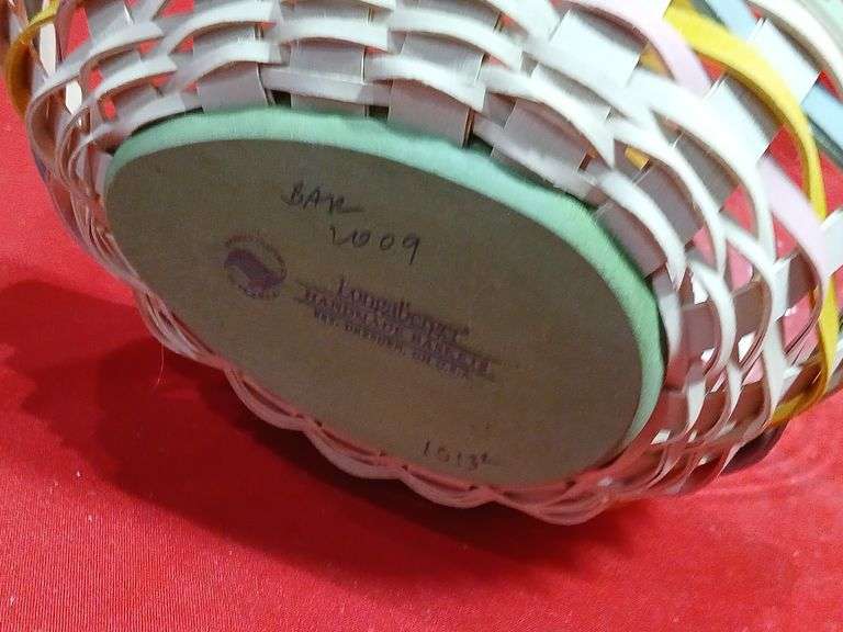 2 multicolor Egg Shaped Easter Baskets - Auction Ohio