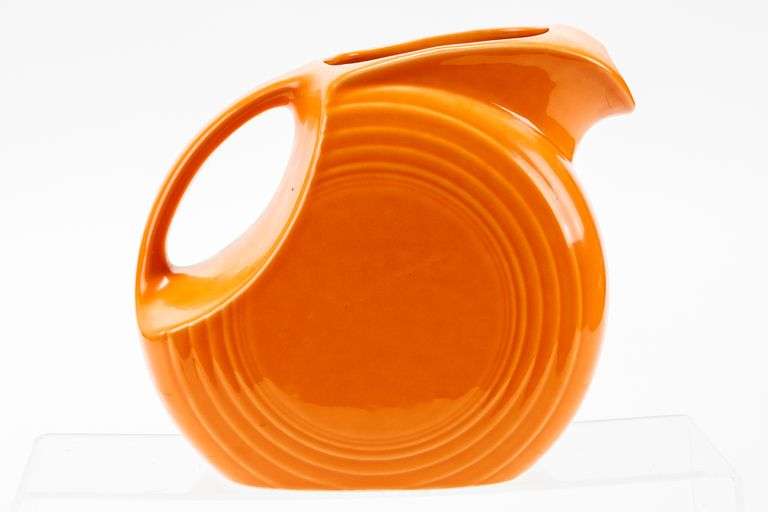 Fiestaware Orange Pitcher - Auction Ohio