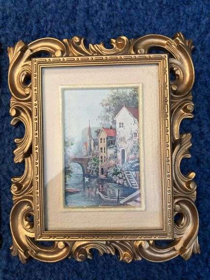Trio of Gold colored plastic frames - Auction Ohio
