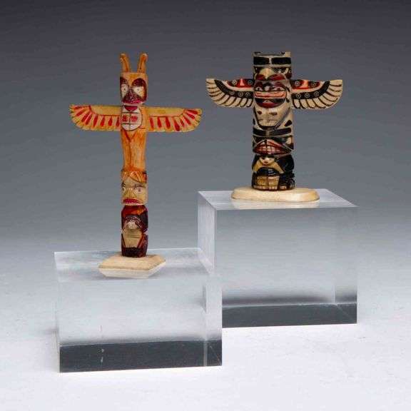 TWO MINIATURE CARVED AND PAINTED BONE TOTEM POLES. - Auction Ohio