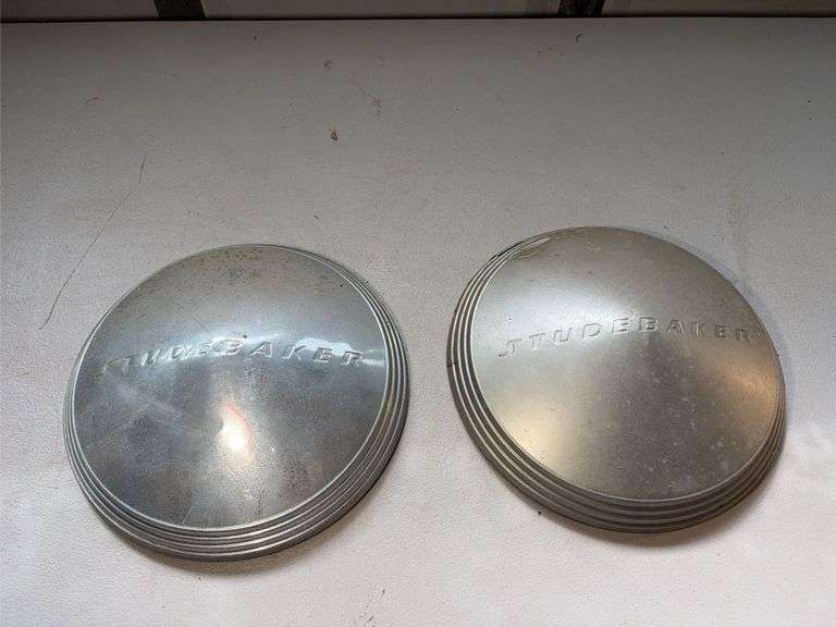 Two Studebaker Hubcaps - Auction Ohio