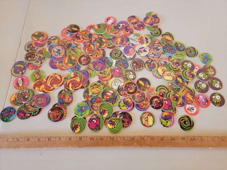Assorted 1990s Pogs - Auction Ohio