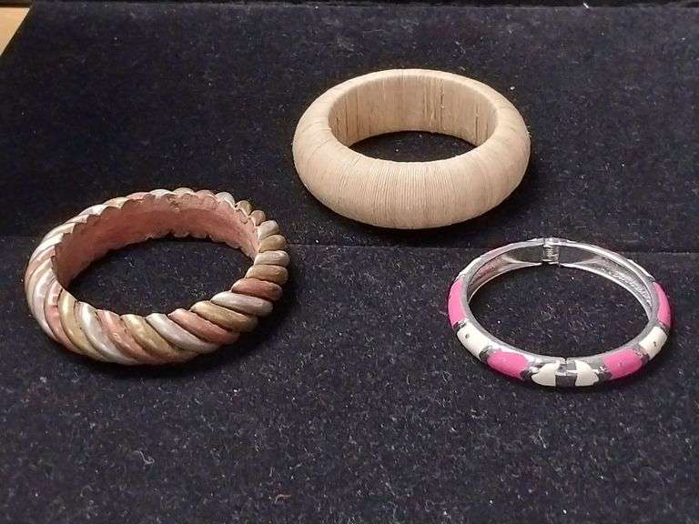 Three Assorted Bracelets With Unique Designs and Markings - Auction Ohio