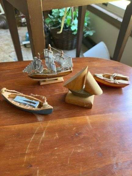 Set of Four Small Wooden Model Boats - Auction Ohio