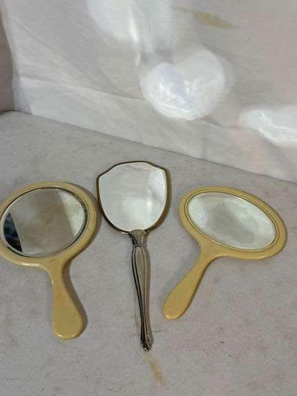 Three Hand Mirrors with Metal and Plastic Frames Featuring Unique ...