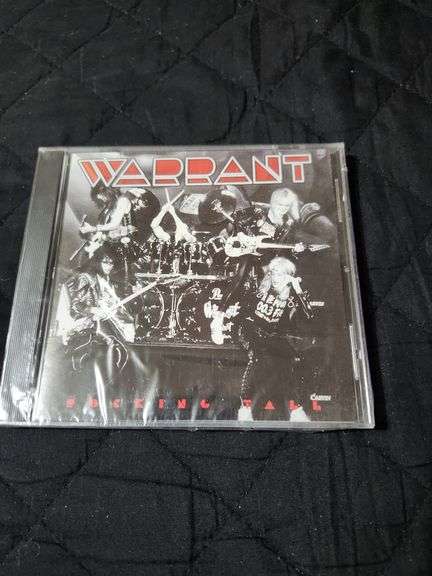 Warrant Rocking Tall Unopened - Auction Ohio