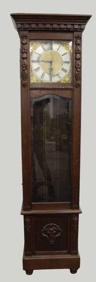 OAK TALL CASED CLOCK WITH DECORATIVE DETAILS. - Auction Ohio