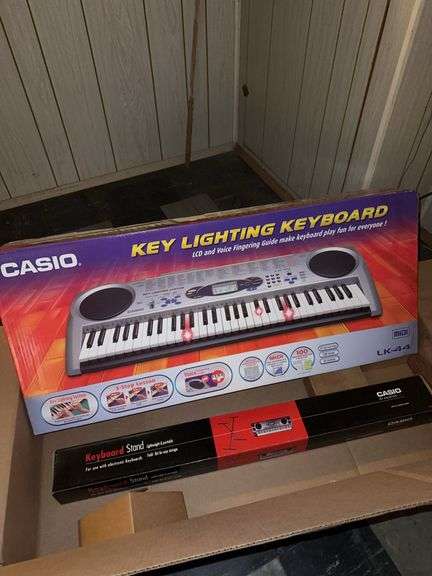 New Casio electronic keyboard with stand-great Christmas gift - Auction ...