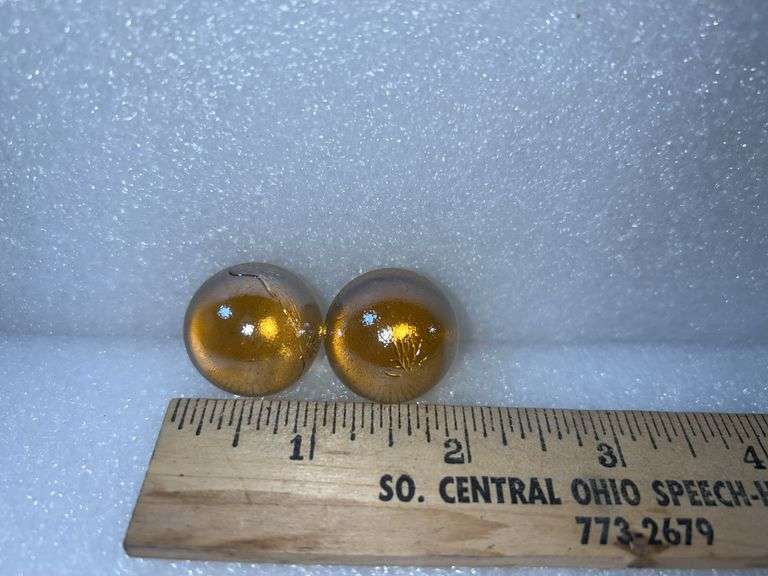 2 Orange Iridescent Shooter Marbles - Auction Ohio