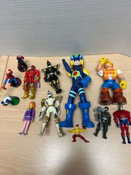 Mixed Action Figures, Including Robots And Superheroes, Varying Sizes ...