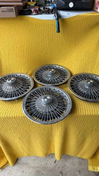 Set of 4 Vintage Hubcaps with Wire Spokes - Auction Ohio