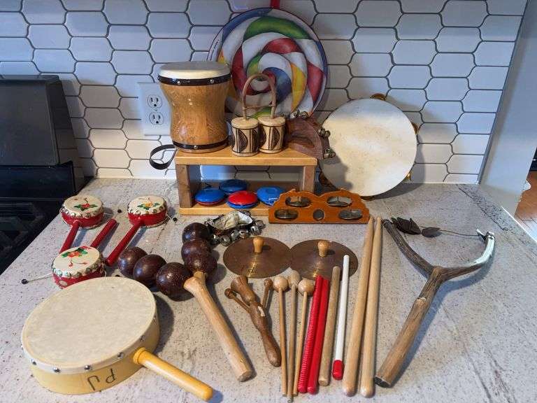 Variety of percussion instruments plus wood flute - Auction Ohio