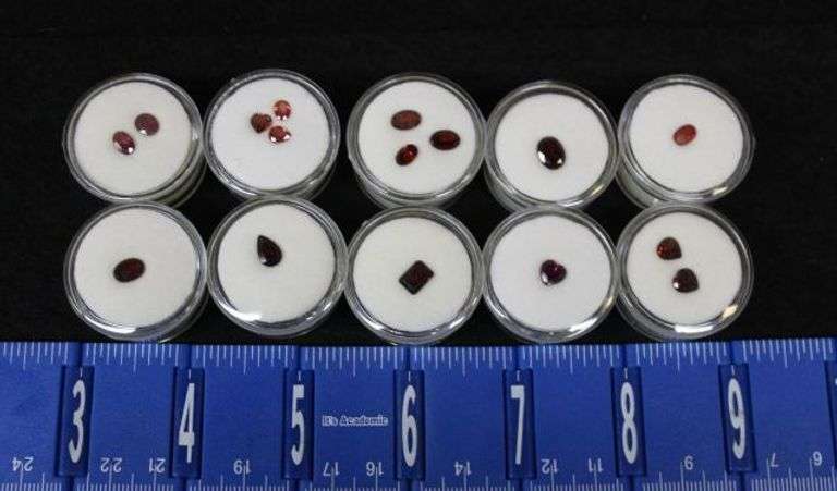 Garnet Gemstones in Small Presentation Jars - Auction Ohio