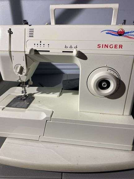 Singer sewing machine model 2517C - Auction Ohio